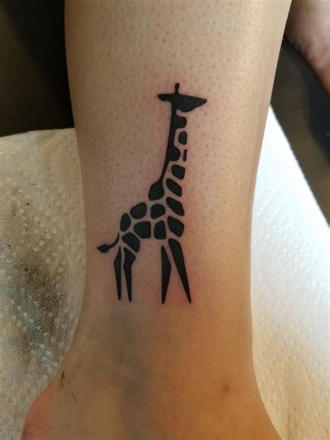 Simple Giraffe Outline Tattoo