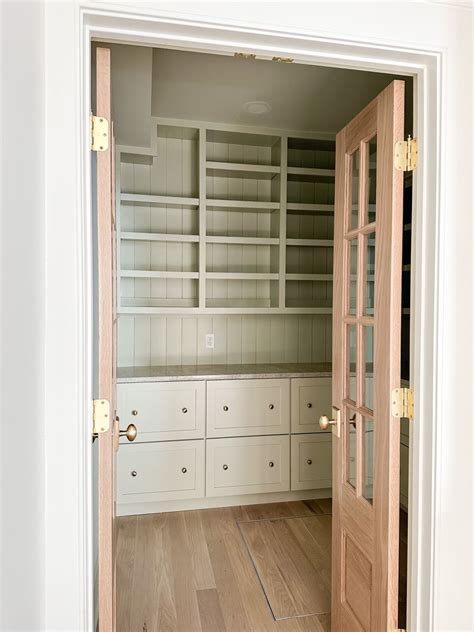 Walk In Pantry With Custom White Oak Doors Pantey Cabinets Built In