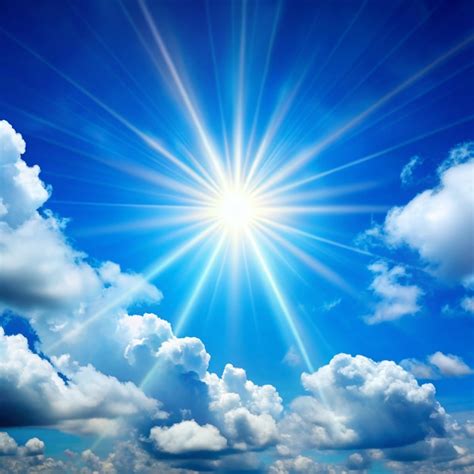 Bright Sunshine With Sun Flares And Clouds On Clear Blue Sky Background