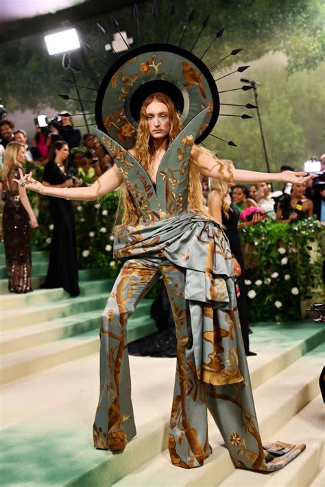 Harris Reed Dons Dramatic Proportions In Patterned Silk Pantsuit With