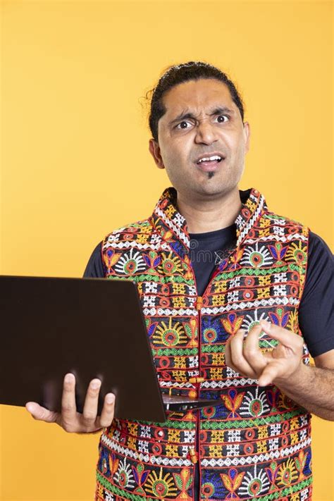 Portrait Of Man Shocked After Seeing Error Message On Laptop Screen