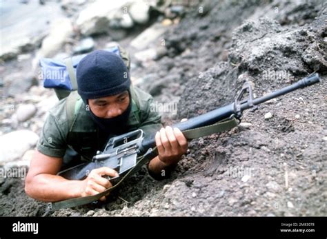 A Member Of The Philippine Special Forces Armed With An M16a1 Rifle