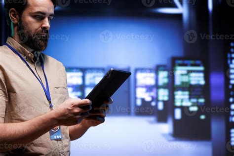 Adept System Administrator Doing Maintenance On Interlinked Computers Creating Server Network