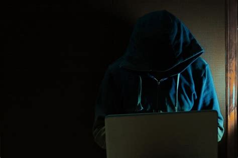 Premium Photo Hacker Using Laptop