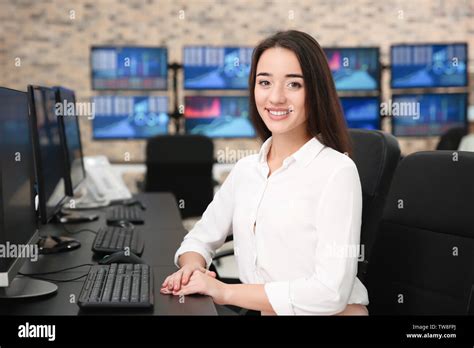 Female Stock Trader Working In Office Stock Photo Alamy