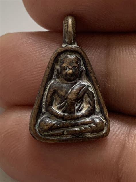 หลวงพ่อเงิน จอบเล็ก Ennxo