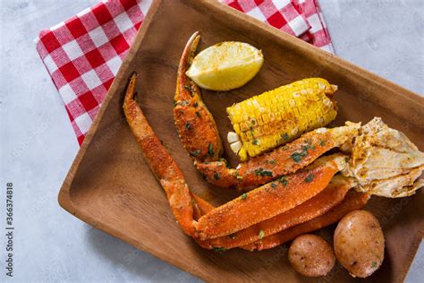 Platter Of Southern Garlic Crabs Seafood Boil With Alaskan Crab Legs