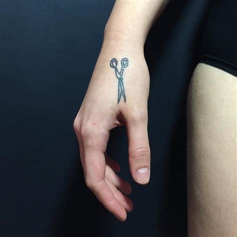 Tiny Scissors On A Hand By Suki Lune Tattoogrid Net