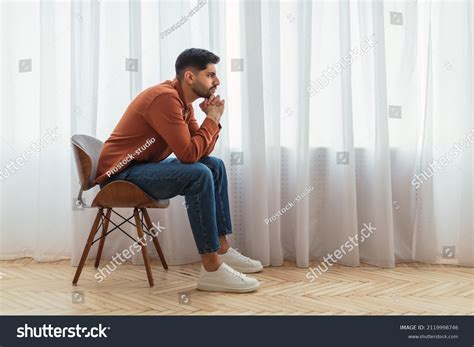 People Sitting Down Side View