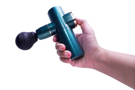 Premium Photo Hand Holding Portable Massager Isolated On White