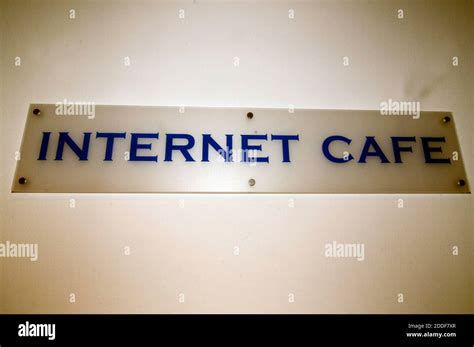 Internet Cafe Sign With Blue Font Online Connection And Access Stock