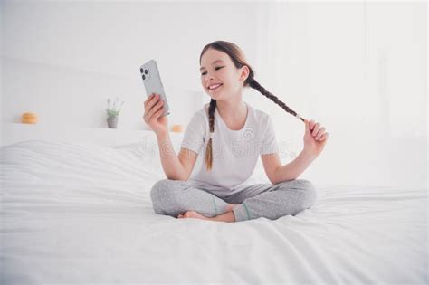 Portrait Of Cute Adorable Cheerful Girl Chatting Enjoying Free Time Cosy Apartment White Light