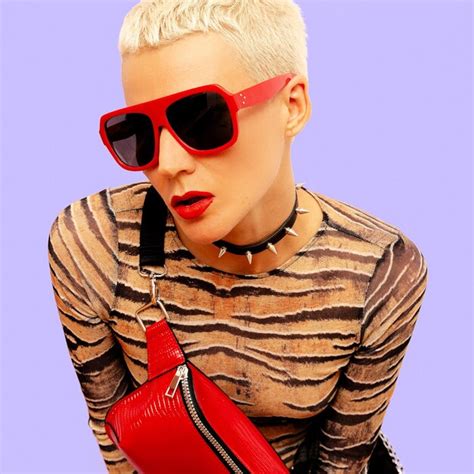 Premium Photo Stylish Alternative Girl Fashion Look Hat Clutch