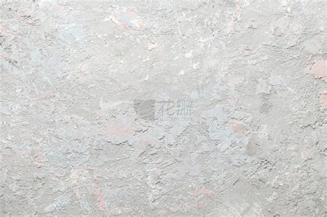 浅灰色灰泥背景纹理与粉色和蓝色色调