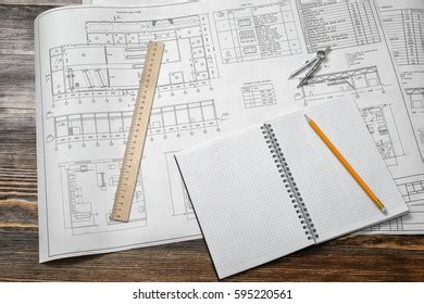 Open Blueprints On Wooden Table Background Stock Photo Shutterstock