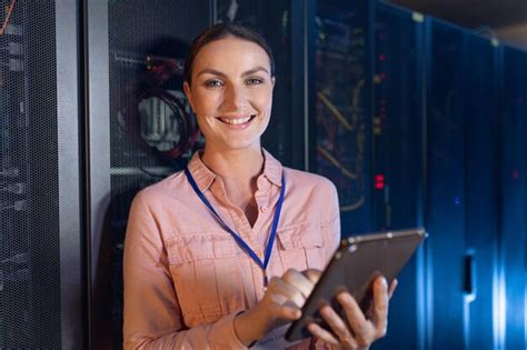 Premium Photo Portrait Of Caucasian Female Engineer Smiling While Using Digital Tablet In