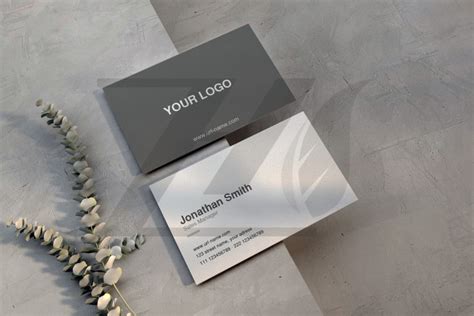 دانلود فایل لایه باز موکاپ کارت ویزیت رنگ روشن روی سطح بتنی زمین دانلود رایگان فایل لایه باز