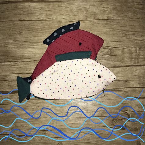 کمدا قیمت و خرید جامدادی پارچه ای طرح ماهی رنگ فقط طرح های داخل عکس