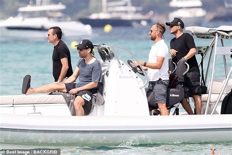 Leonardo Dicaprio And Tobey Maguire Are Spotted Arriving At St Tropezs Club 55 After The Oscar