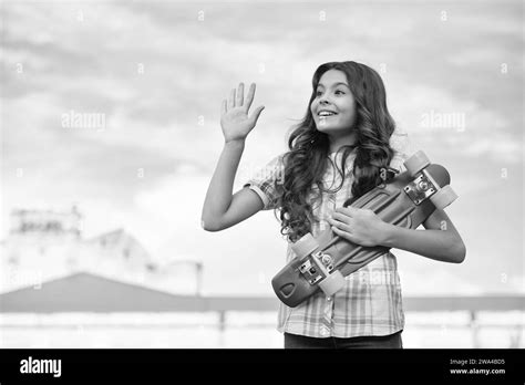 Positive Teen Girl Skateboarding Outdoor Teen Girl Skateboarding With