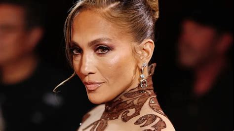 Jennifer Lopezs Sheer Gown Exposes Her Toned Abs
