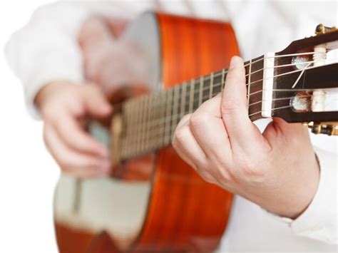 Man Playing Classical Guitar Close Up Isolated Premium Photo