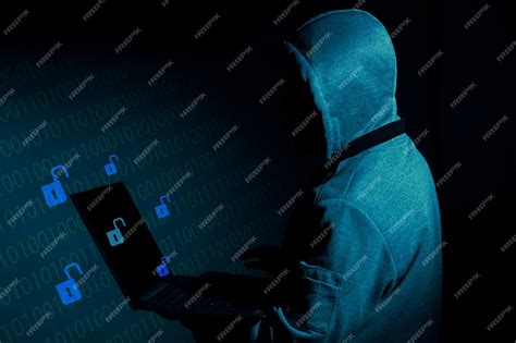 Premium Photo Hacker Try To Hack Information By Laptop And Computer