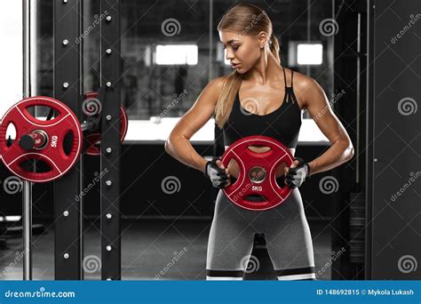 Athletic Girl Working Out In Gym Fitness Woman Doing Exercise Stock