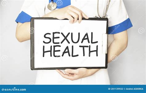 Doctor Holding A Card With Text SEXUAL HEALTH Medical Concept Stock Photo Image Of