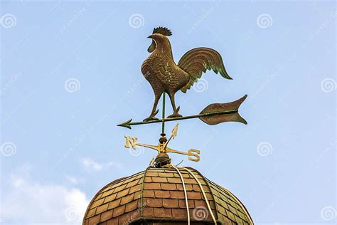 Beautiful View Of Weather Vane In The Form Of A Metal Rooster And An