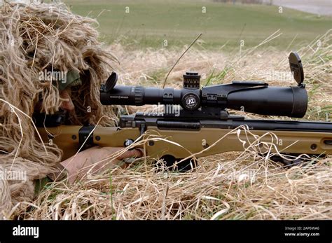 British Infantryman With A Long Range Sniper Rifle L115a3 Which Has A
