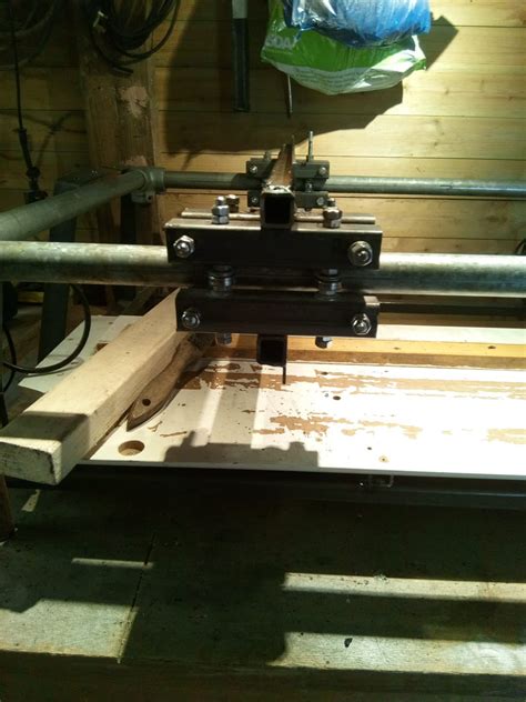 few pics of my first diy cnc built from scrap material s with little knowledge and huge