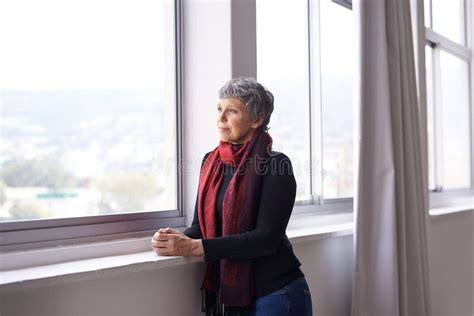 Window Thinking And Senior Woman With Sunshine Ideas Or Retirement