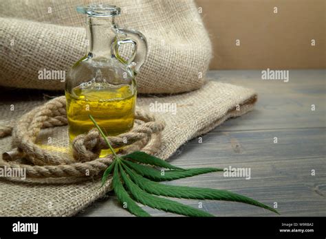 Conceptual Types Of Cannabis Products Concept Image With A Cannabis Leaf Glass Decanter And