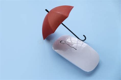 Computer And Network Security Concept Red Umbrella Over A Computer Mouse Stock Image Image Of