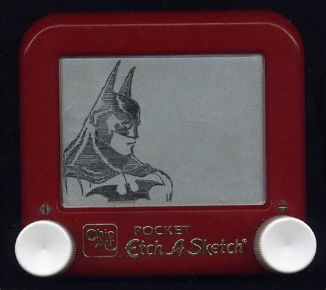 how does an etch a sketch work at explore