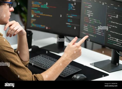 It Developer Working Online Software Development On Pc Monitors At