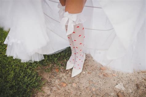 The Bride On A Walk Shows Her Bright Stockings Stock Image Image Of