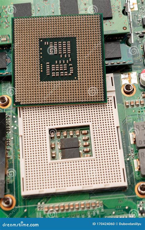 Computer CPU Close Up On The Motherboard Background Socket Of Central Process Unit Connection
