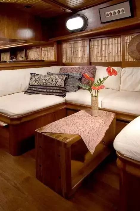 Luxurious Yacht Interior Design With White Couches And Pillows