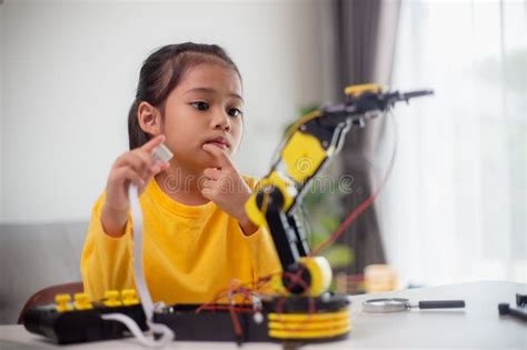 Stem Education Concept Asian Students Learn At Home By Coding Robot