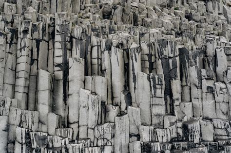 Premium Photo Texture Of Basalt Stones On The Beach
