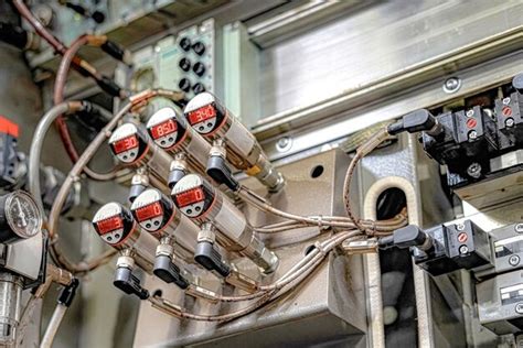 Premium Photo Electronic And Mechanical Control System For The Hydraulics Of A CNC Machine