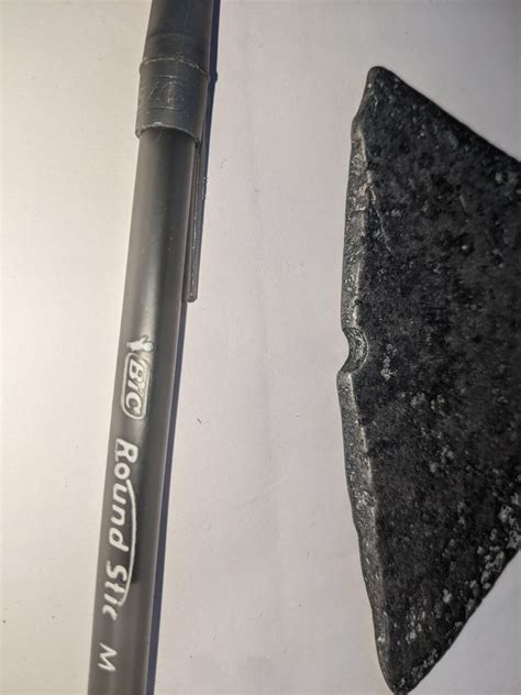 metallic object with round indentation lightweight non magnetic found