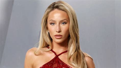 Alix Earle Strikes A Pose In Nude Outfit Held Up By Only 2 Strings