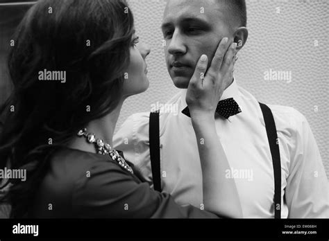 Man And Woman Is Hidden From View Behind A Trailer Stock Photo Alamy