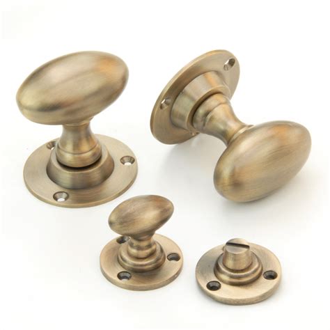 Vintage Period Style Oval Solid Antique Brass Door Knobs Handles Pair Jonesandgrey