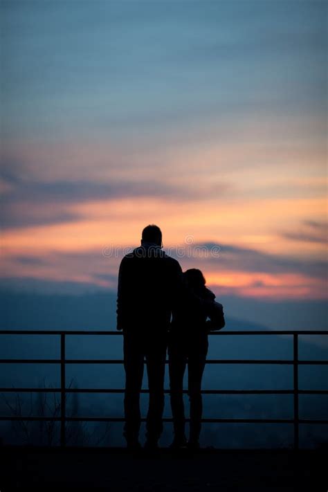 Silhouette Of Couple Watching Sunset Stock Image Image Of Black