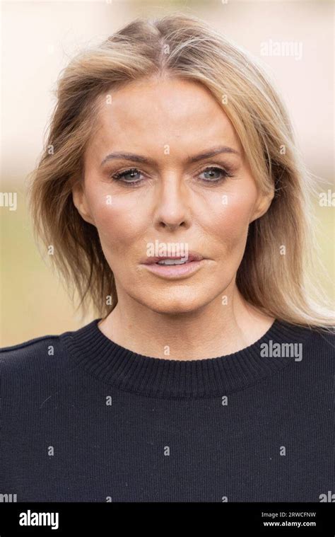 Patsy Kensit Poses For Photographers Upon Arrival At The Burberry