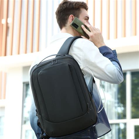 Fenruien Men's backpack เหมาะกับ 15.6 แล็ปท็อปการเดินทางเพื่อธุรกิจ ...